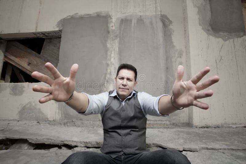 Man Reaching Down Towards the Camera Stock Photo - Image of building ...