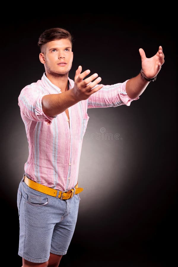 Man Reaching With Both Hands Stock Photo - Image of pose, beauty: 29177042
