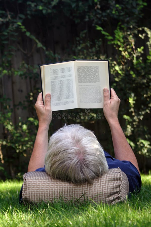 Man reading stock image. Image of pillow, book, blue - 10848173