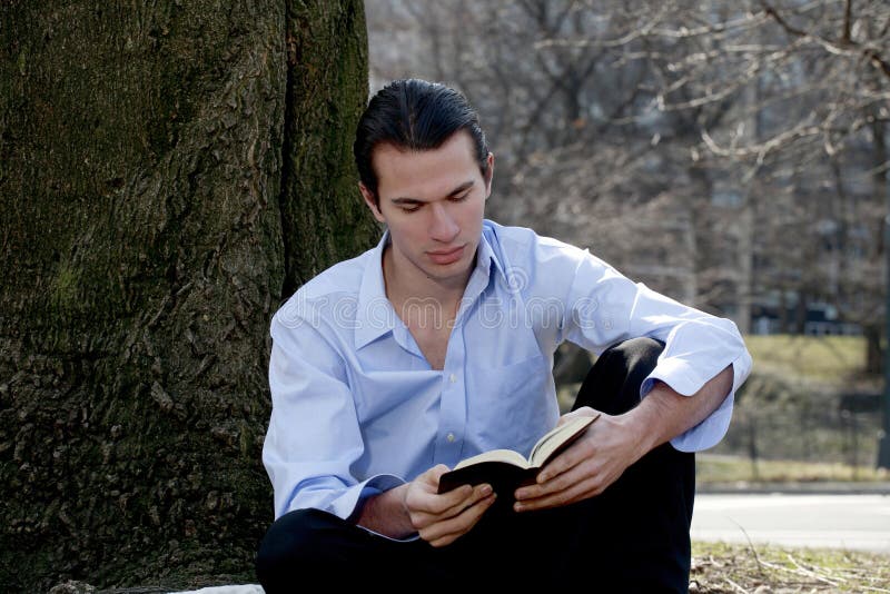 Man reading Bible stock photo. Image of prayer, city, park - 6489108