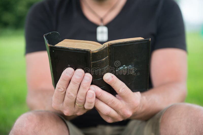 Man reading a bible stock photo. Image of religion, book - 72541234