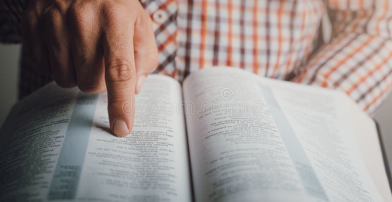 Man Reading the Bible Pointing the Text Stock Photo - Image of bible ...