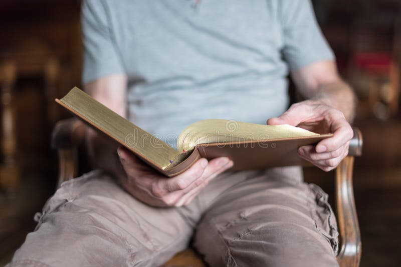 Man reading the Bible stock image. Image of religious - 58839409