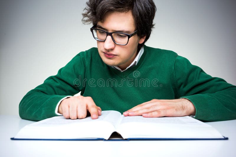 Man reading big book stock image. Image of academic, learn - 72071439