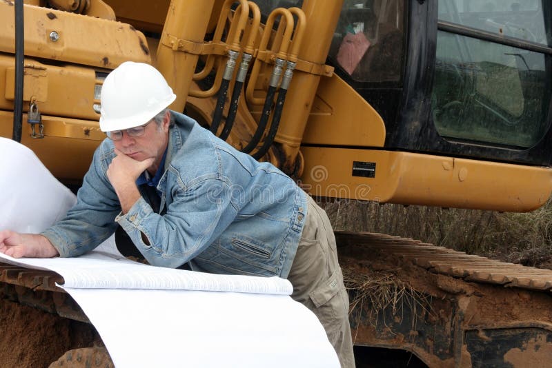 Man reading blueprint stock photo. Image of male, construct - 6884602