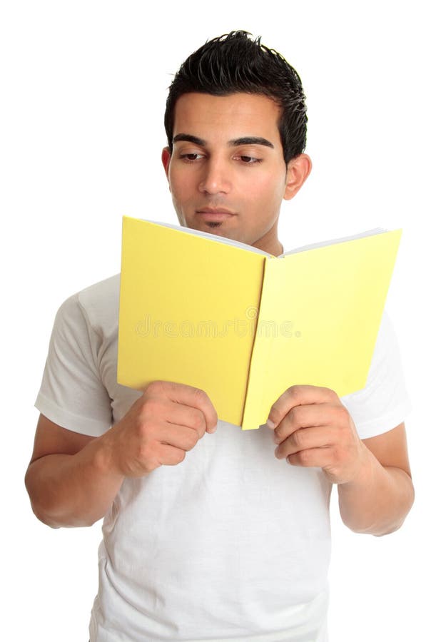 Man reading from a book stock image. Image of library - 13300637