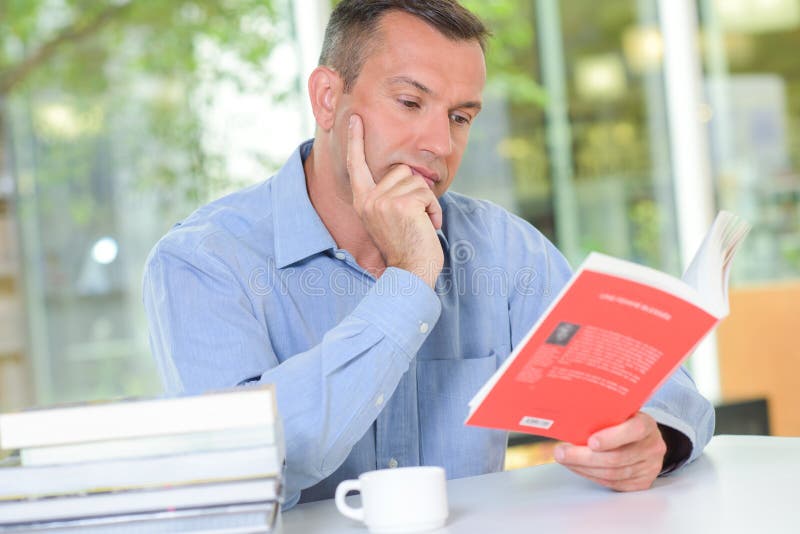 Man reading book stock photo. Image of freedom, young - 198376710