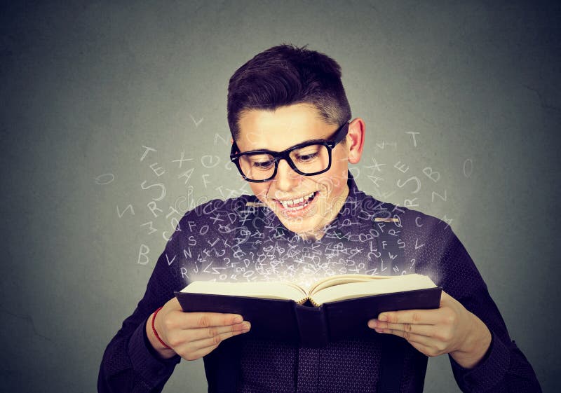 Man Reading a Book with Alphabet Letters Coming Out Stock Photo - Image ...