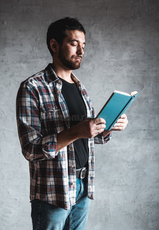 Man Reading. Book in His Hands Stock Image - Image of book, hand: 203572897