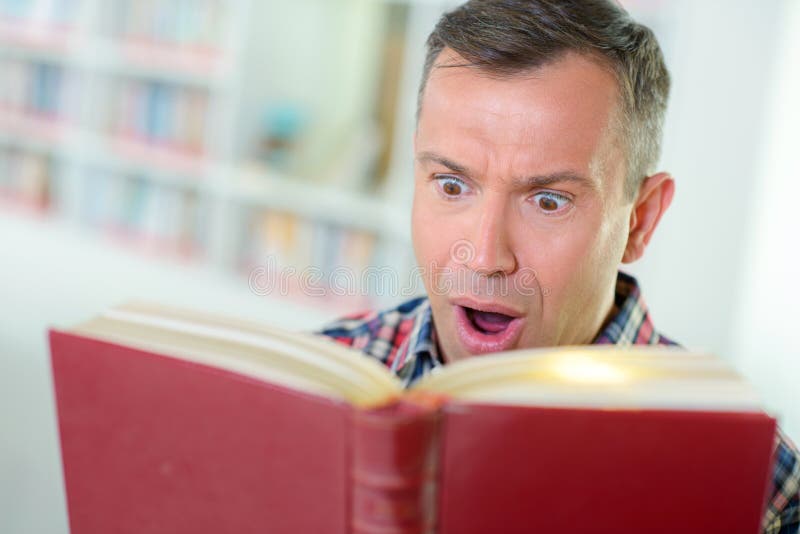 Man Reading Book Horrified Expression Stock Photo - Image of fright ...