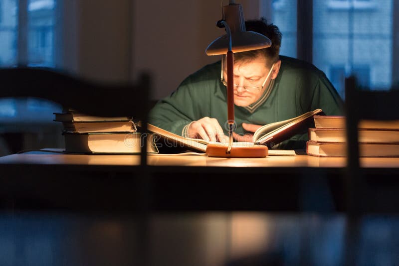 Man Reading Under Lamp Stock Photos - Free & Royalty-Free Stock Photos ...