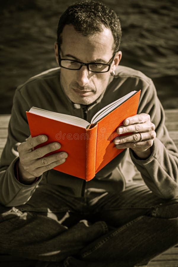 Man reading book stock image. Image of happy, cover, literature - 54009427