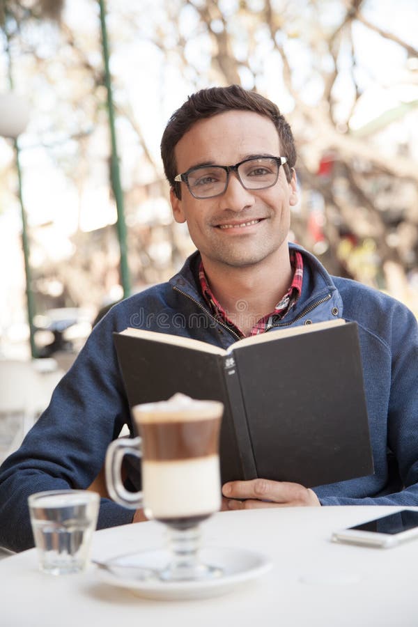 Man Reading a Book in the Street Stock Image - Image of enjoy, drinking ...