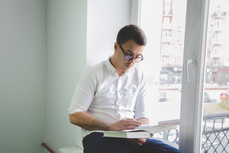 Man reading a book stock image. Image of book, student - 51593871