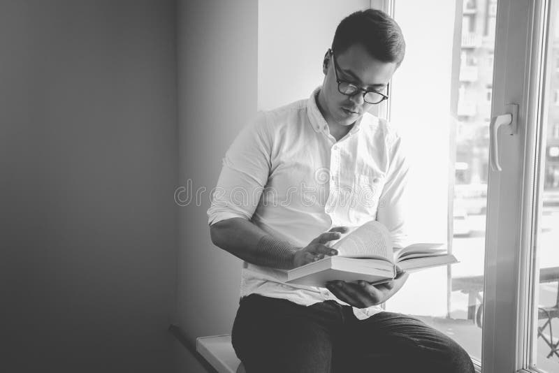 Man reading a book stock photo. Image of university, young - 51595168