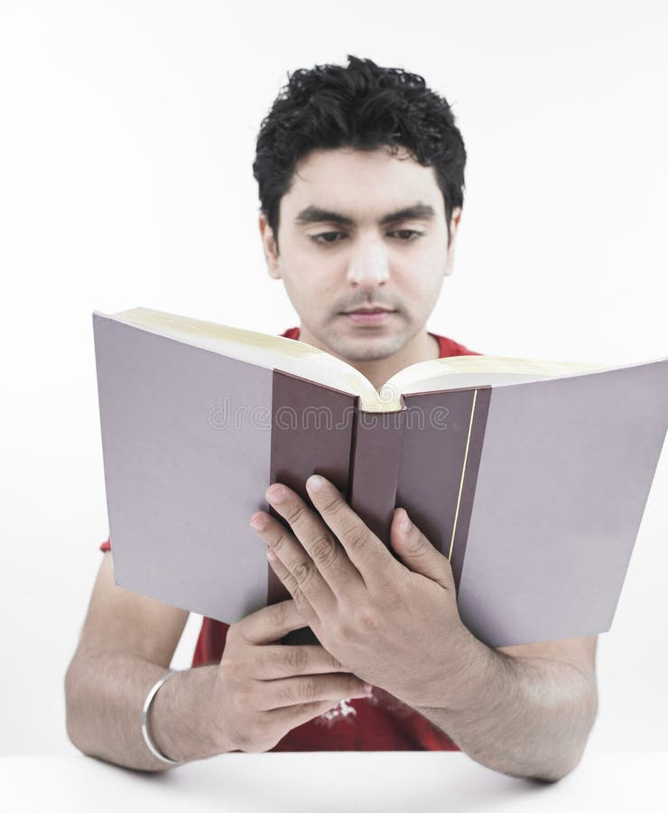 Man Reading an Encyclopedia Stock Image - Image of graduate, attractive ...