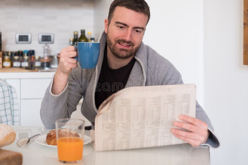 Man Reading His Newspaper during Morning Breakfast Stock Image - Image ...