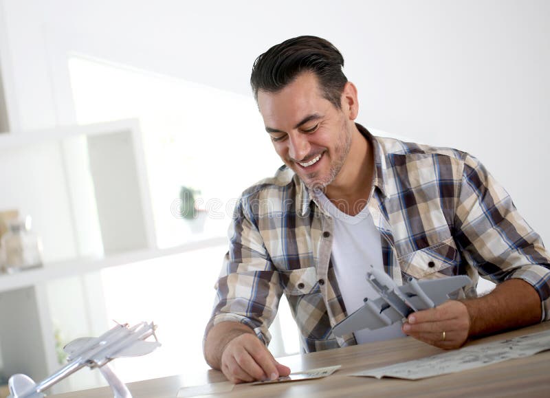 Man Reading Instructions Assembling Plane Toy Stock Image - Image of ...
