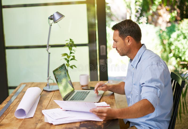 Man, Reading and Laptop with Paperwork for Remote Work from Home Office ...