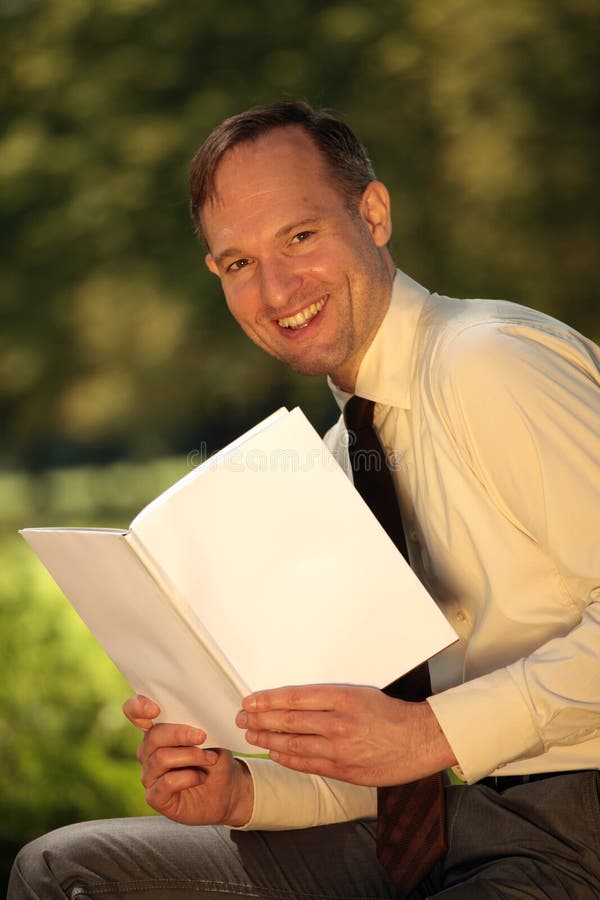 Man reading magazine stock image. Image of newspaper - 10368957