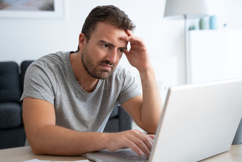 Man Reading Negative News on His Computer Stock Photo - Image of ...