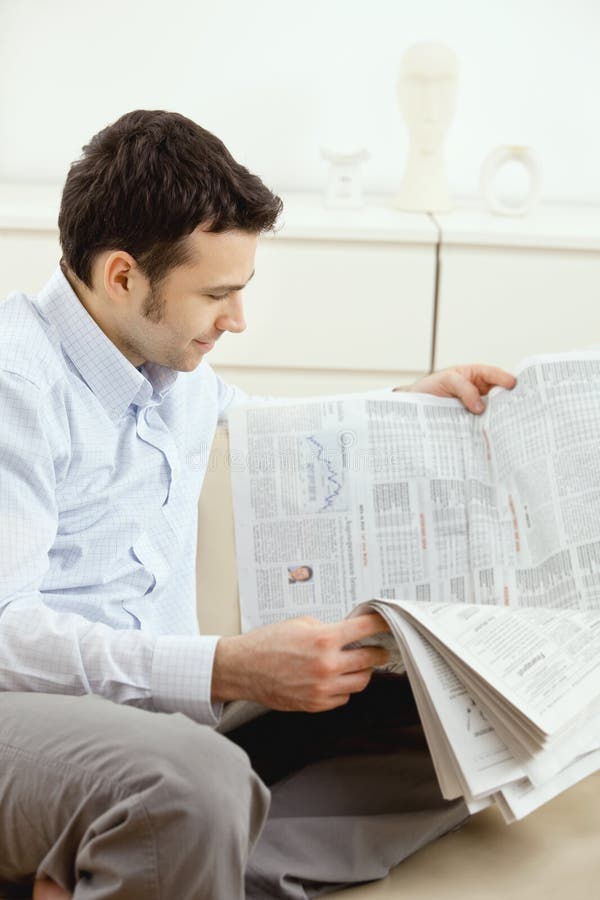 Man reading newspaper stock image. Image of face, adult - 11116765