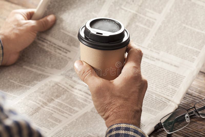 Man Reading Newspaper on Table Stock Image - Image of read, male: 83528099