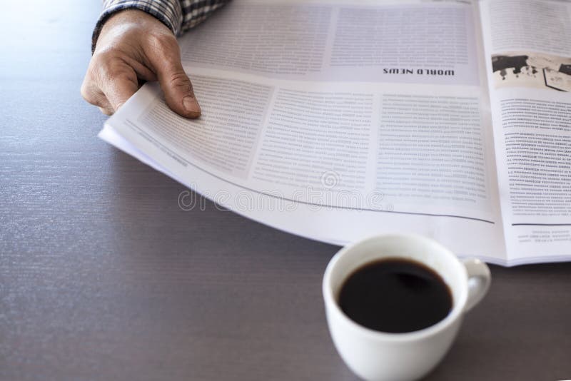 Man Reading Newspaper on Table Stock Photo - Image of paper, news: 84649694