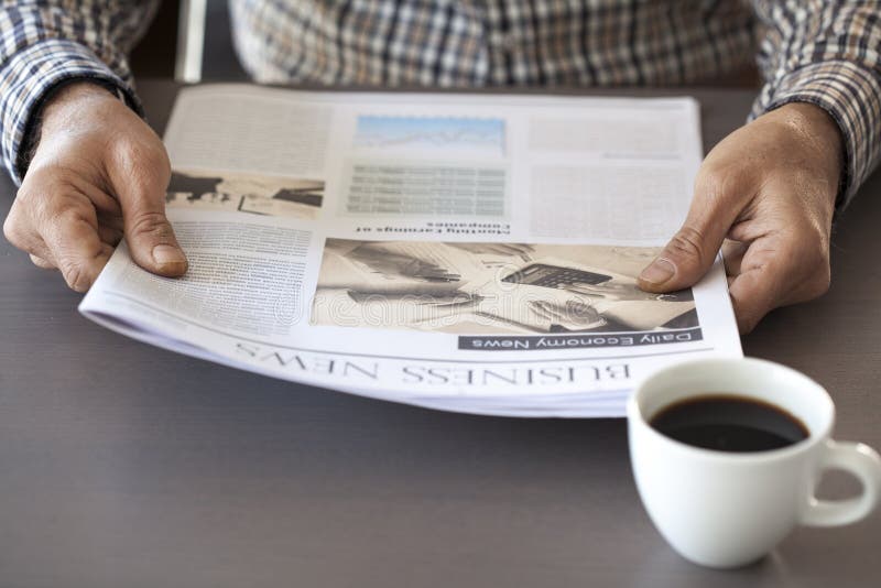 Man Reading Newspaper on Table Stock Image - Image of news, reading ...