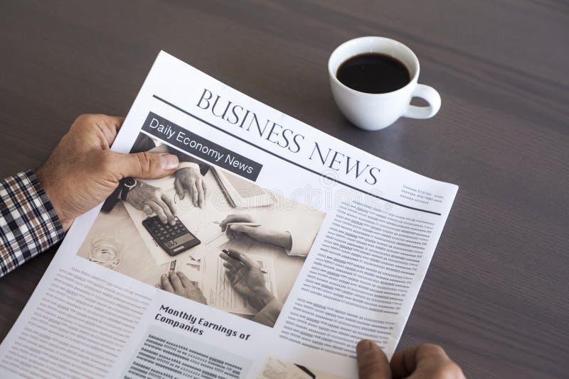 Man Reading Newspaper on Table Stock Photo - Image of economy, hand ...