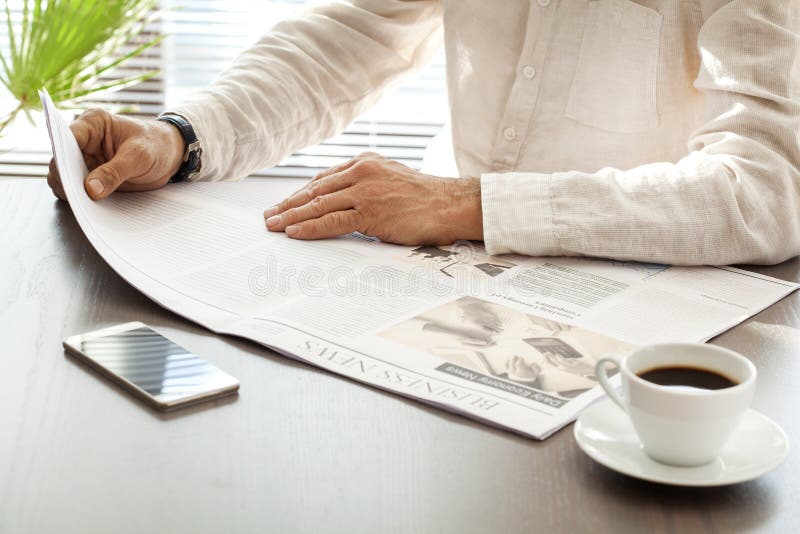 Man Reading Newspaper on Table Stock Photo - Image of journal, reader ...