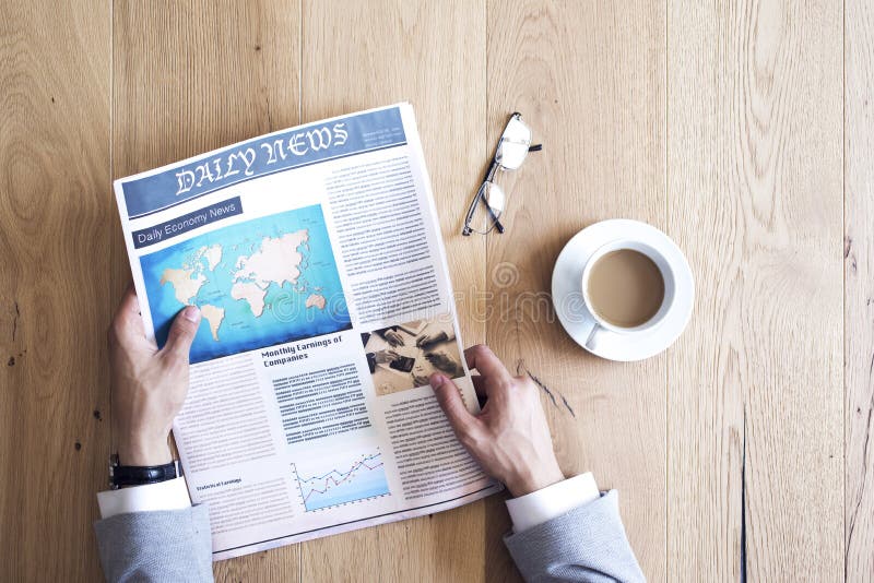 Man Reading Newspaper on Table Stock Photo - Image of person, business ...