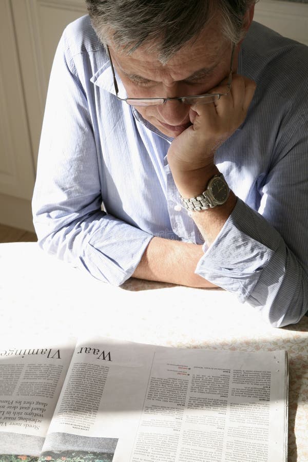 Man reading paper stock photo. Image of caucasian, article - 5858916
