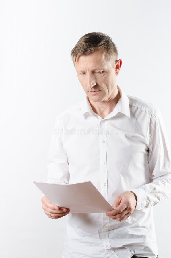 Man reading paper stock photo. Image of color, document - 51255966