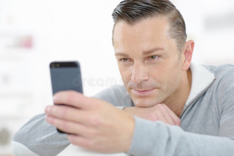 Man reading text message stock image. Image of smart - 89689961