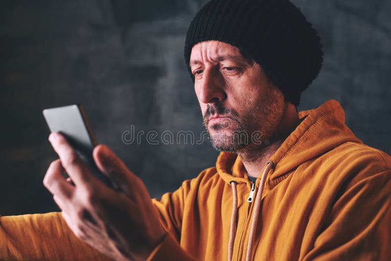 Man Reading Text Message on Mobile Phone Stock Photo - Image of ...