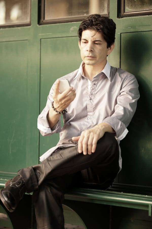 Man reading a text message stock photo. Image of communication - 35217382