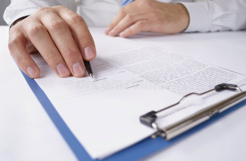 Man Reading a Typed Document Stock Image - Image of clipboard, desk ...