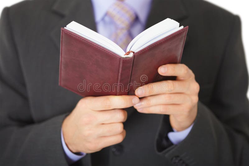 Man Reads Entries in Notebook - Close-up Stock Image - Image of ...