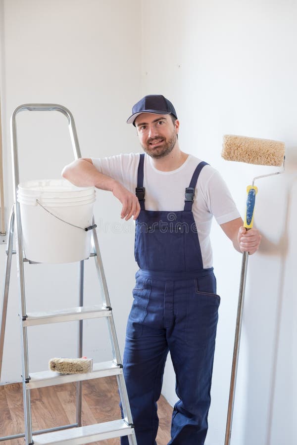 Man Ready To Paint One Wall Holding Painting Tools Stock Image - Image ...