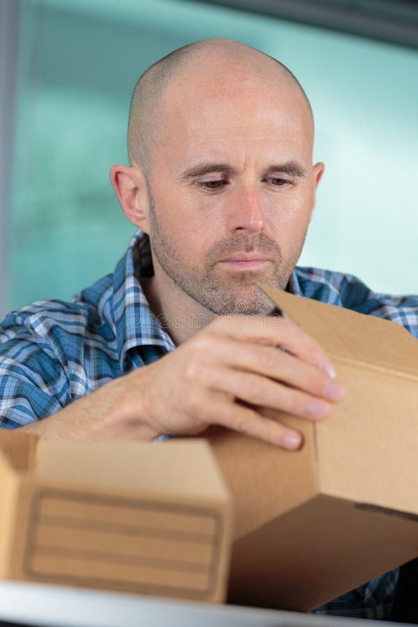 Man Received Express Parcel Stock Image - Image of house, brown: 93901037