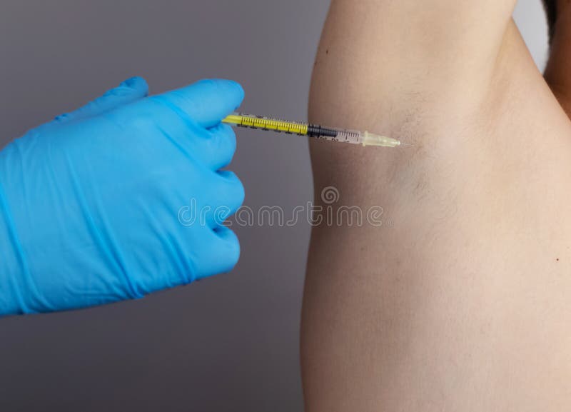 Man Receiving Botox Injection in Armpit As Treatment of Hyperhidrosis ...