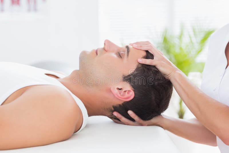 Man receiving head massage stock image. Image of injury - 51614825