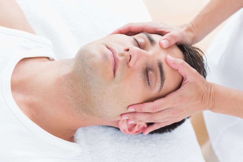 Man receiving head massage stock image. Image of health - 54759547
