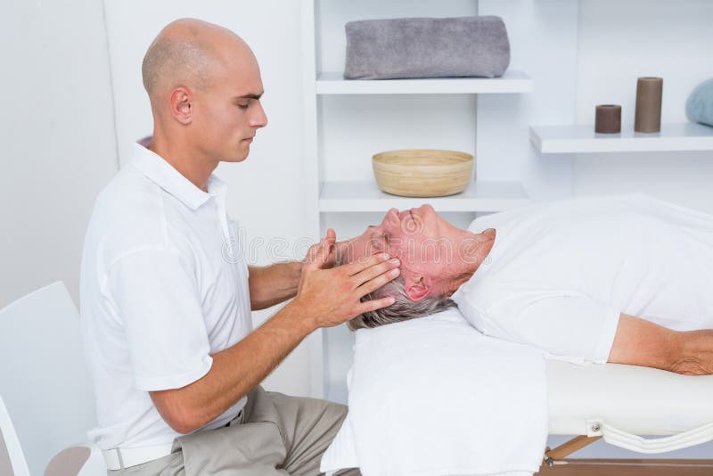 Man receiving head massage stock image. Image of health - 54759547