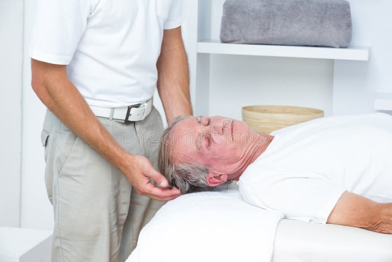 Man receiving neck massage stock photo. Image of examining - 54261686