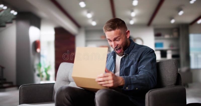 Man Receiving Parcel or Delivery Package Stock Photo - Image of side ...