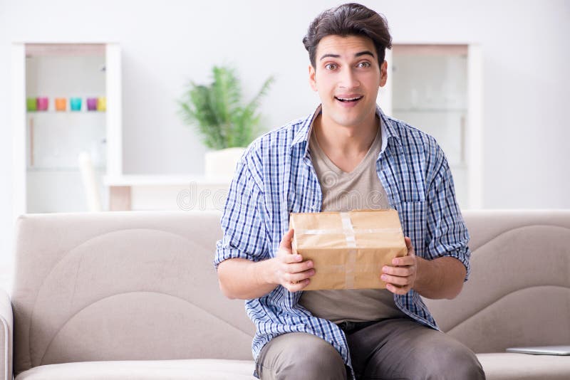 The Man Receiving Parcel at Home Stock Photo - Image of parcel ...