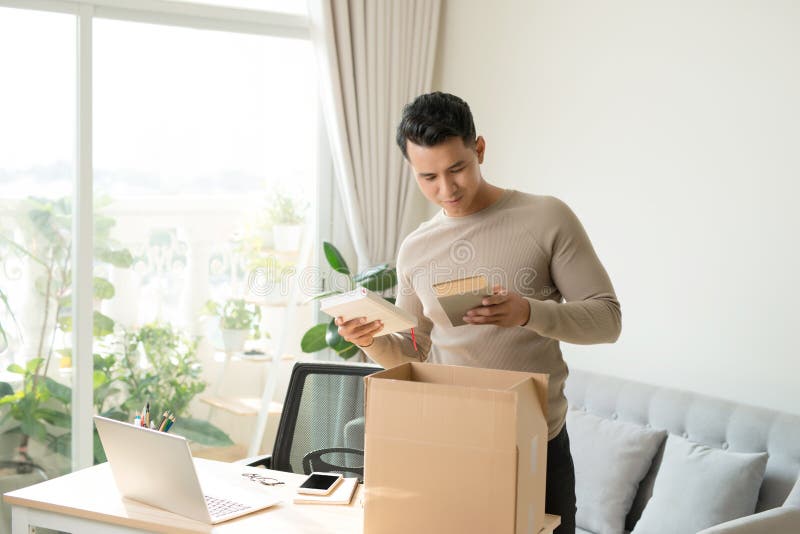 Man Receiving Parcel at Home Stock Photo - Image of goods, opening ...