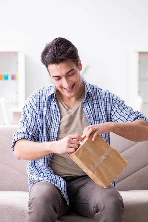 The Man Receiving Parcel at Home Stock Image - Image of logistics ...